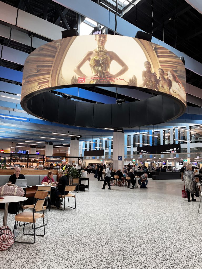 Puig features Gaultier Divine campaign at Melbourne Airport