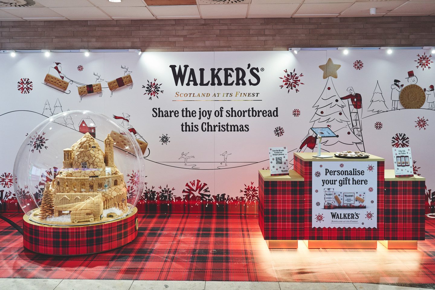 Walker’s Shortbread displays snow globe activation at Edinburgh Airport